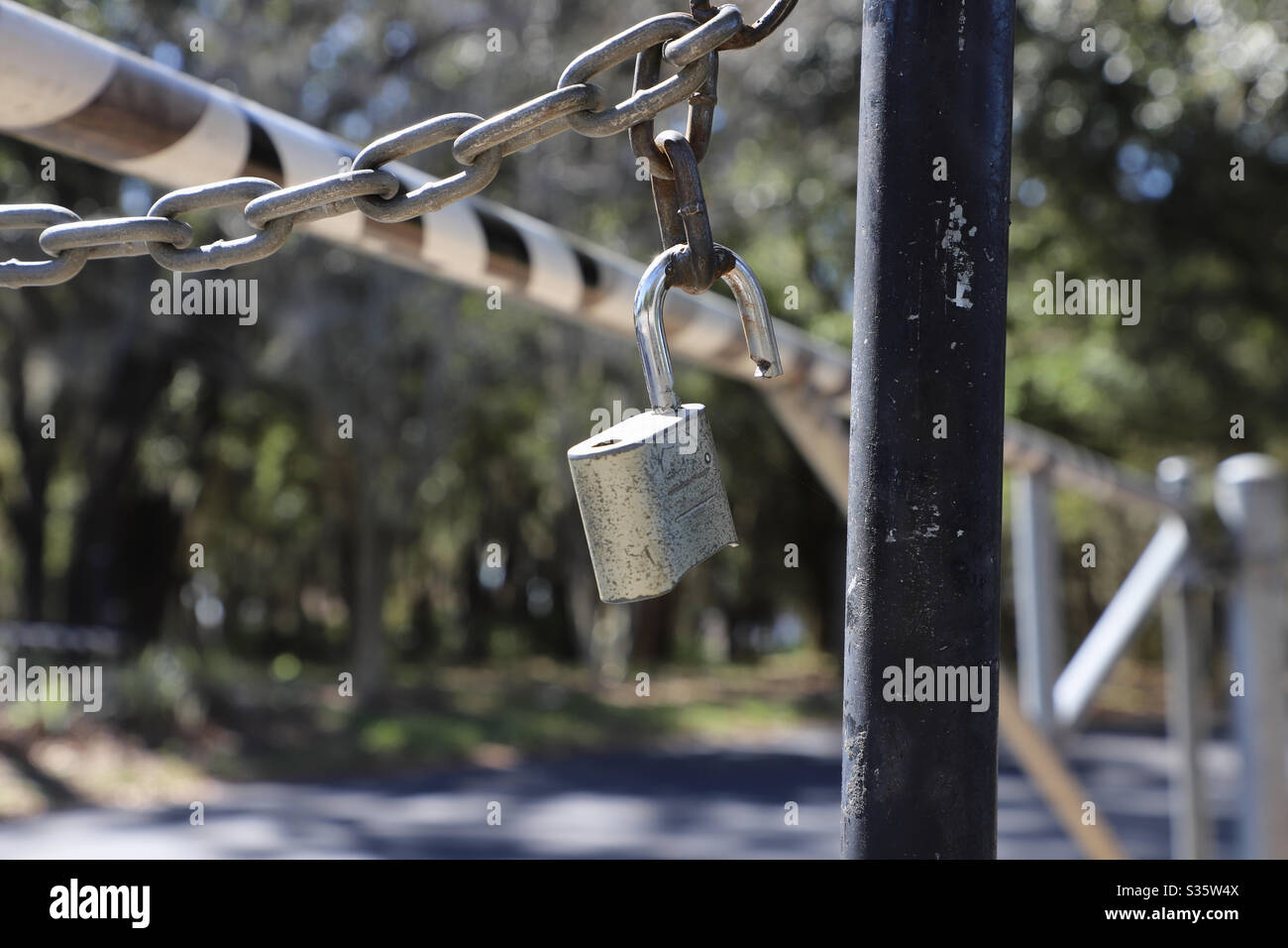 Padlock suspended hi-res stock photography and images - Alamy Padlock suspended hi-res stock photography and images - Alamy