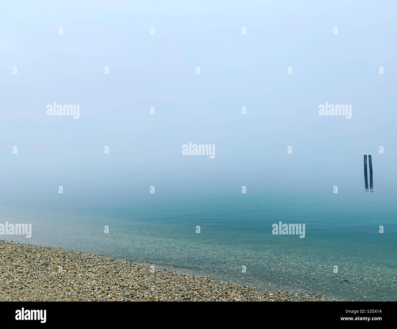 Waters edge in the fog Stock Photo - Alamy