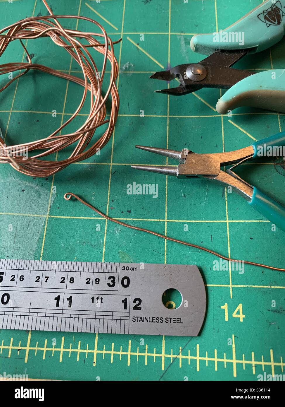 Wire bending with tools Stock Photo - Alamy