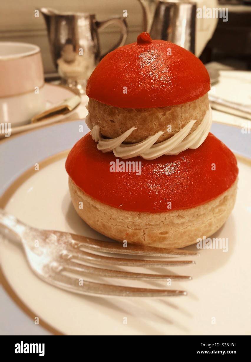 Religieuse- classic French pastry made with two choux cases Stock Photo ...