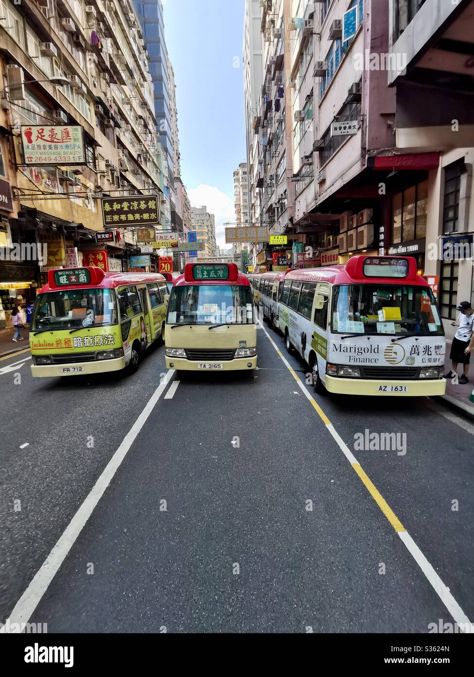 Red minibuses in Mongkok, Hong Kong Stock Photo - Alamy
