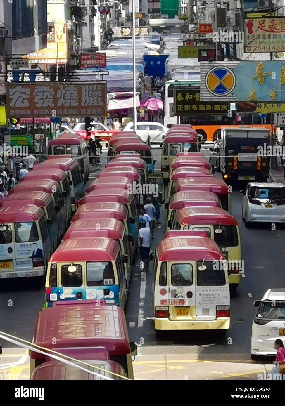 Red minibuses in Mongkok, Hong Kong Stock Photo - Alamy