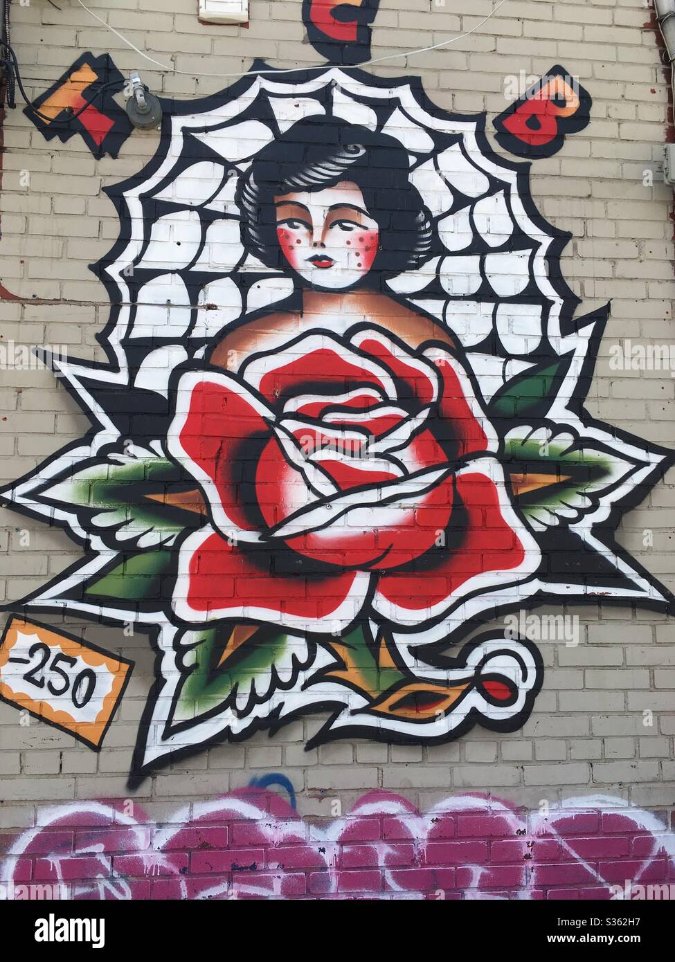 Street art graffiti rose hi-res stock photography and images - Alamy