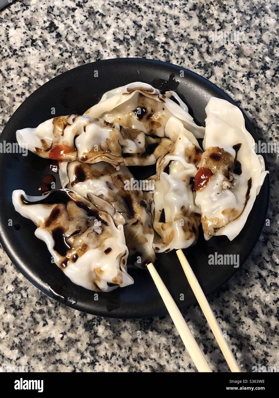 Black and white dumplings hi-res stock photography and images - Alamy