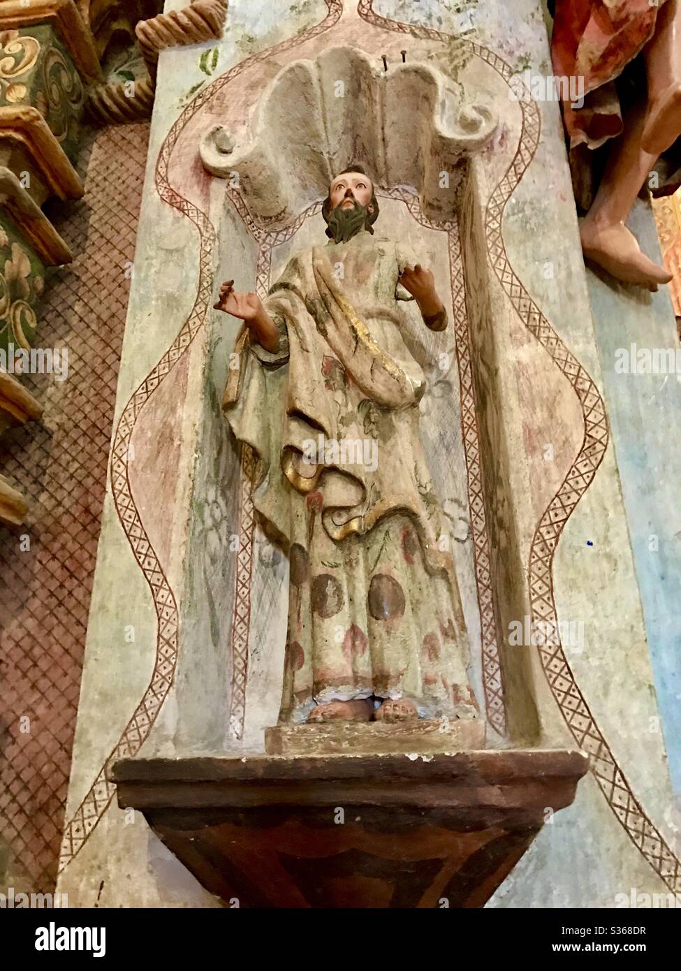 Old wooden carving of saint Stock Photo - Alamy