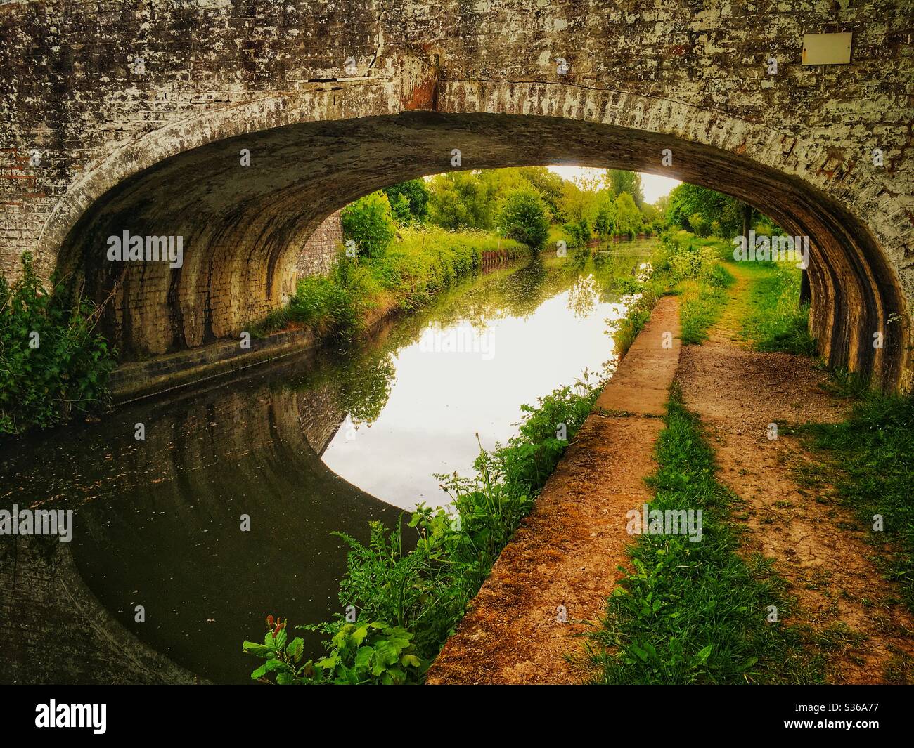 Arch bridge over Trent and Mersey canal in Cheshire Uk Stock Photo - Alamy