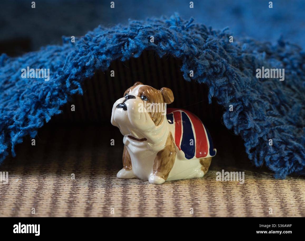 British bulldog figure takes cover Stock Photo - Alamy
