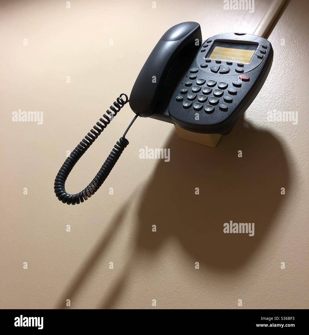 Floating office phone Stock Photo - Alamy