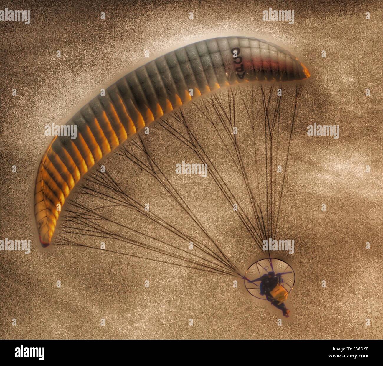 Paragliding with creative background Stock Photo - Alamy
