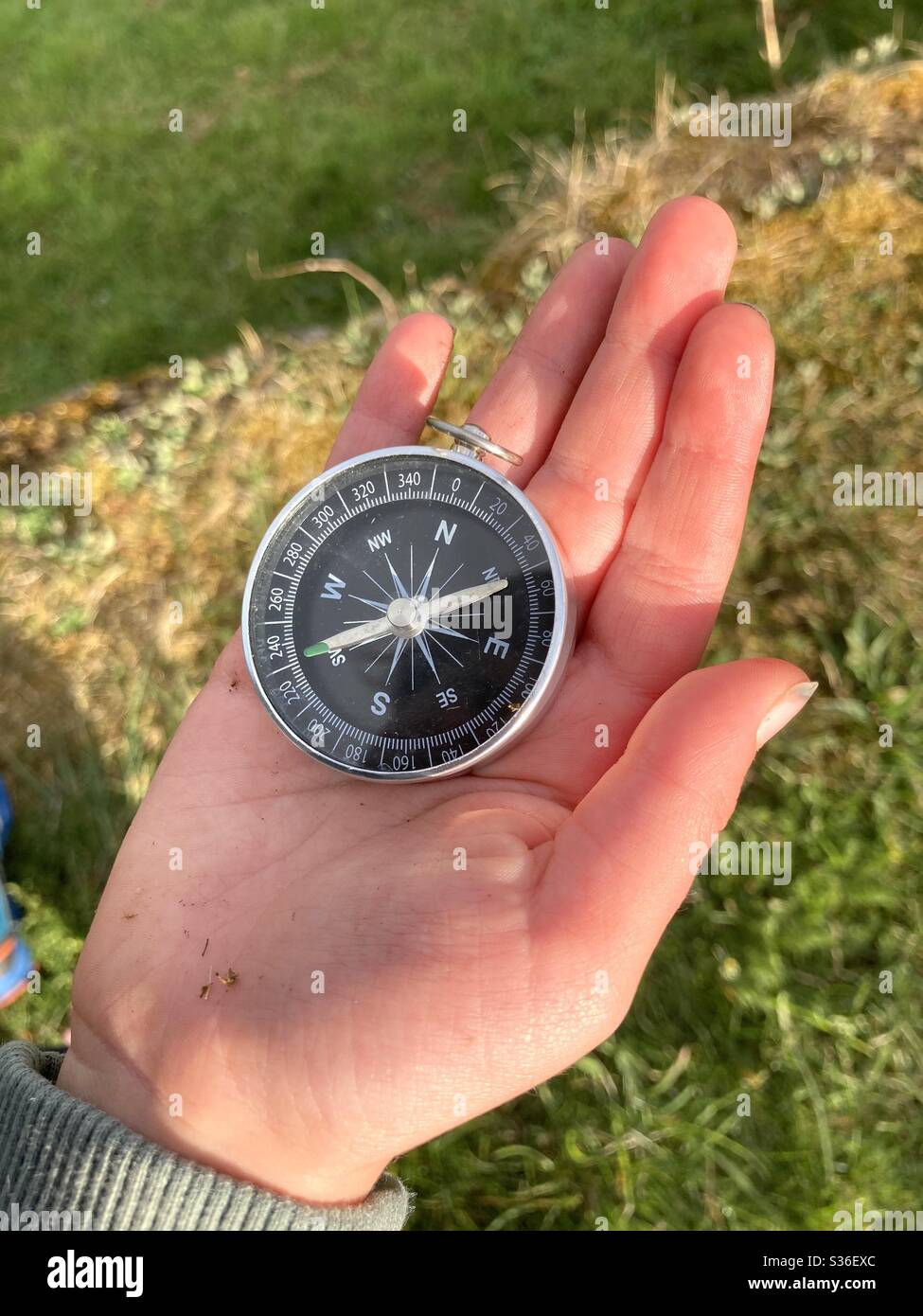 Hand orienteering hi-res stock photography and images - Alamy