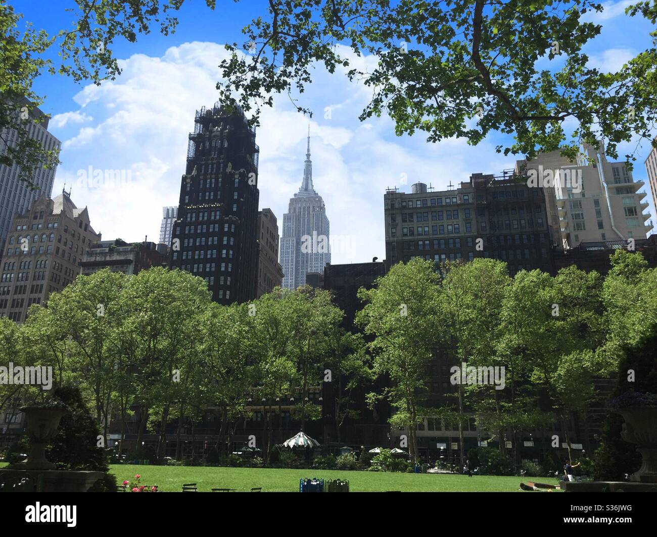 Bryant Park is an urban oasis on 42nd St. with the empire state ...