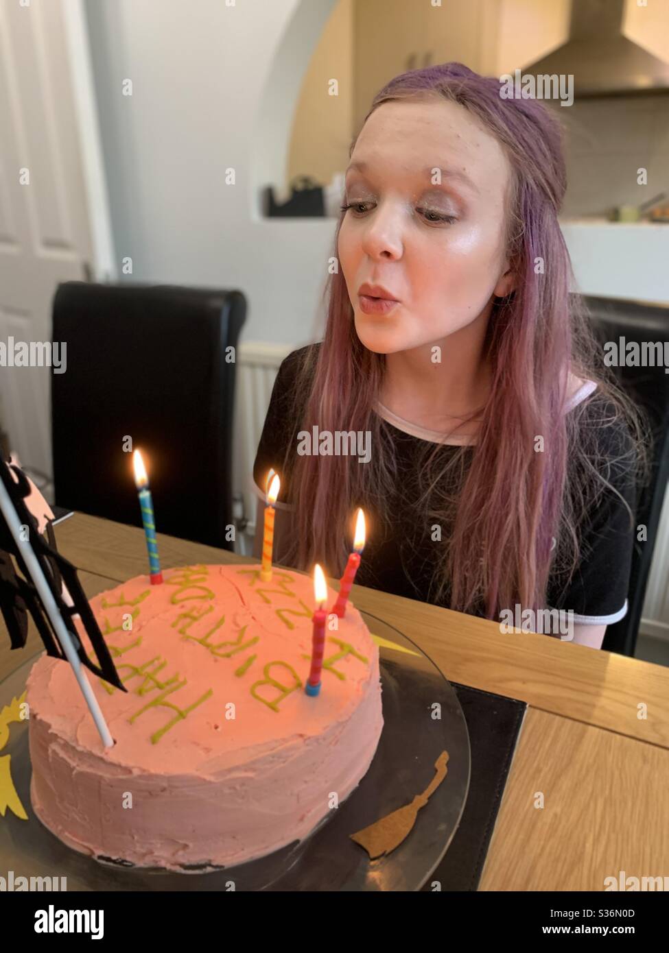 Candles blow out hi-res stock photography and images - Alamy