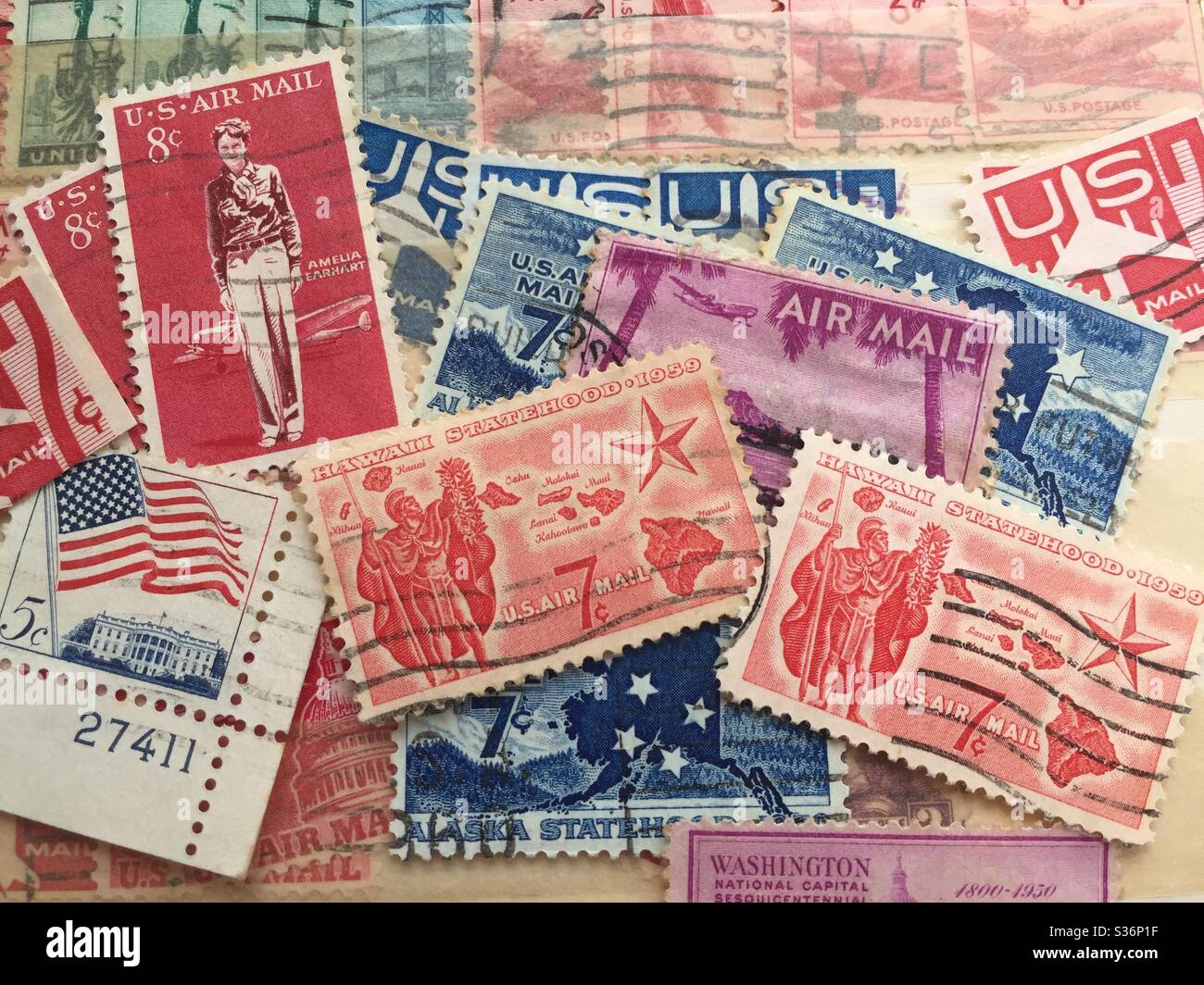 Close up of US commemorative stamps in a stamp collectors stock book ...