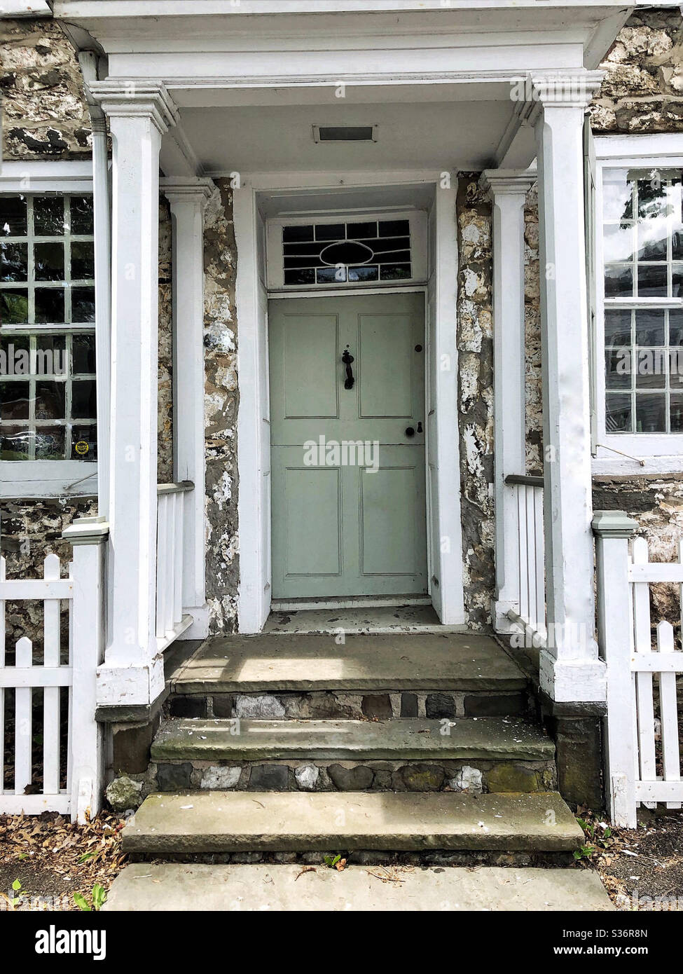 Two hundred year old stone house, front entry door Stock Photo - Alamy
