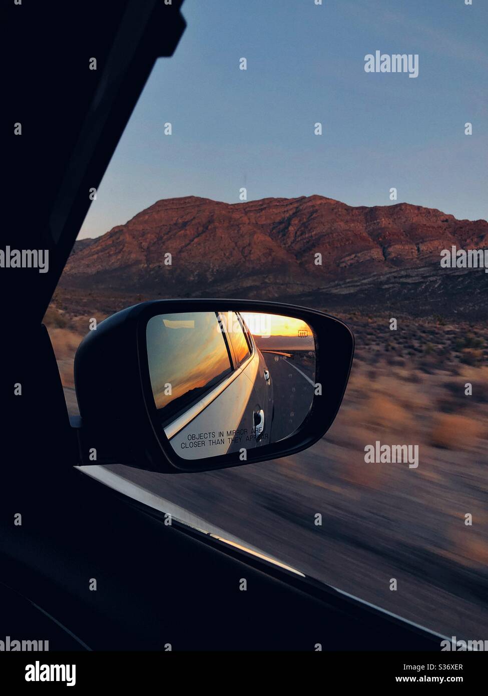 Driving into sunset hi-res stock photography and images - Alamy