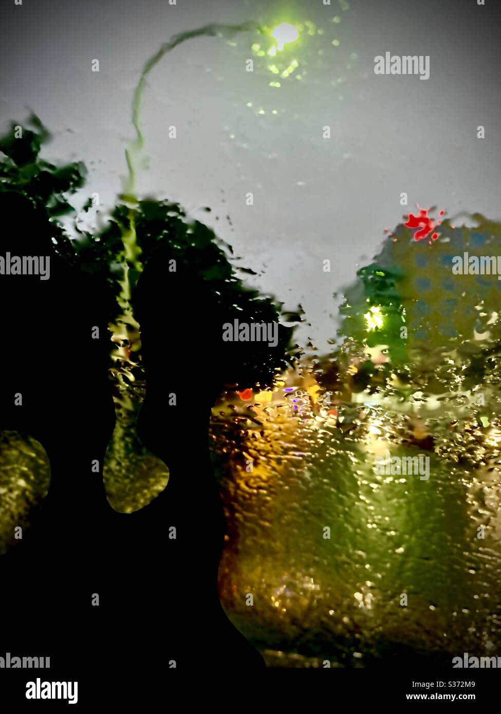 Rain from a car window Stock Photo - Alamy