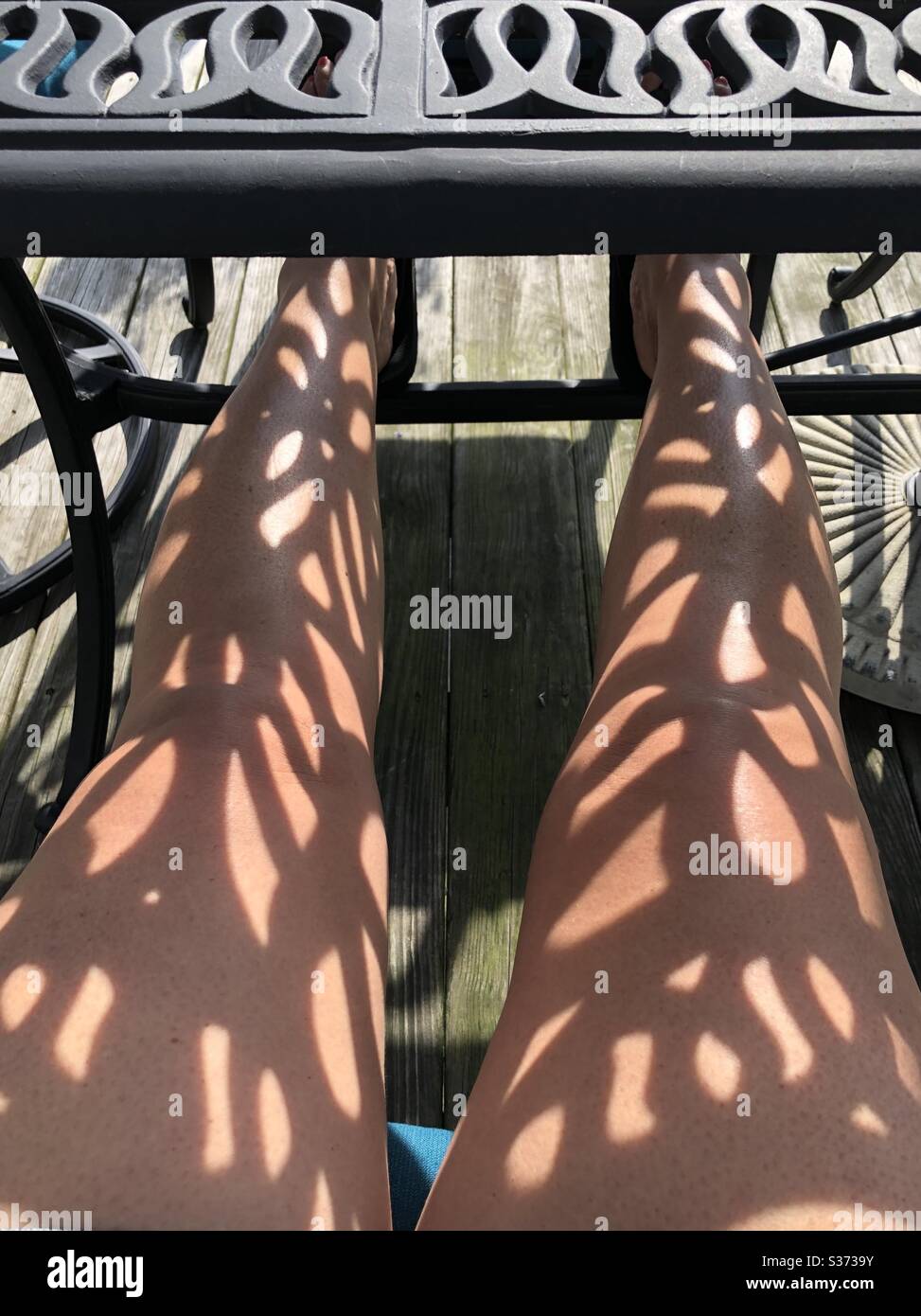 Woman under the table hi-res stock photography and images - Alamy