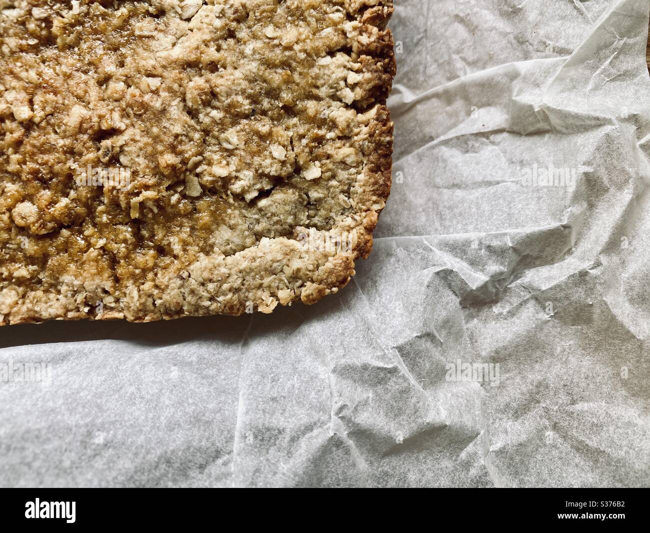 Closeup view of a rustic and traditional homemade flapjack. Made with ...