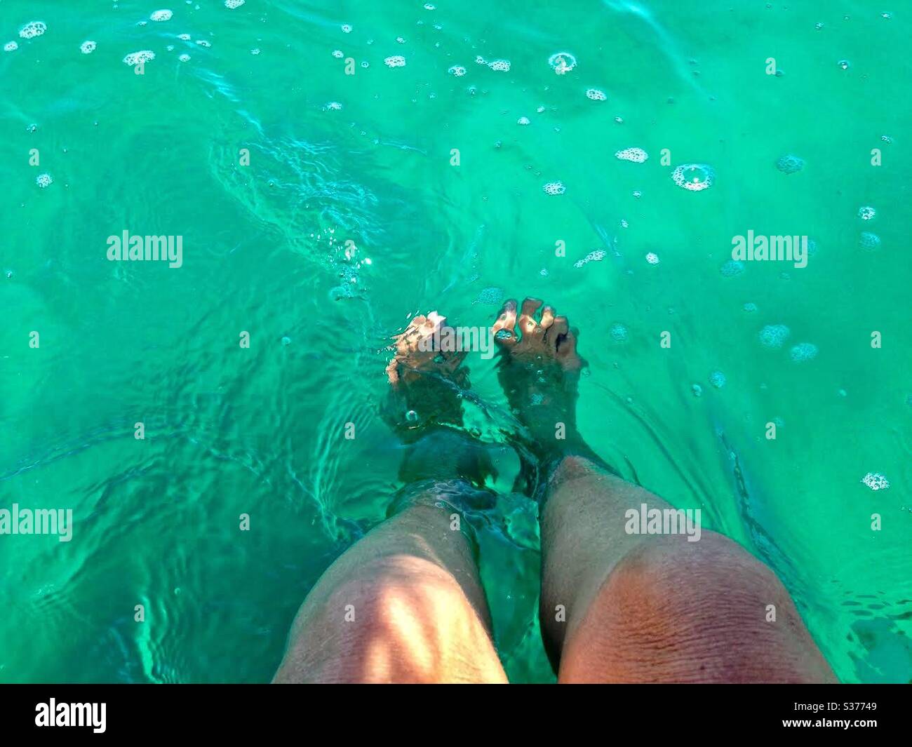 Feet in sea hi-res stock photography and images - Alamy