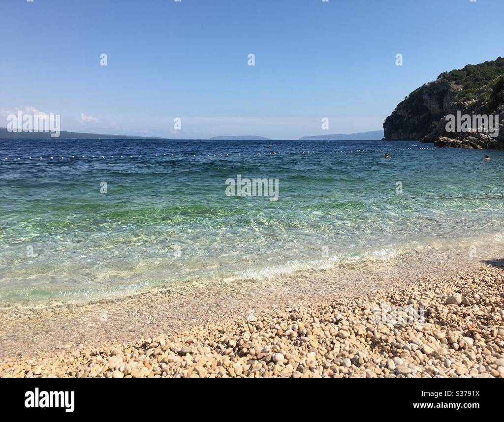 Pebble beach in Croatia Stock Photo - Alamy