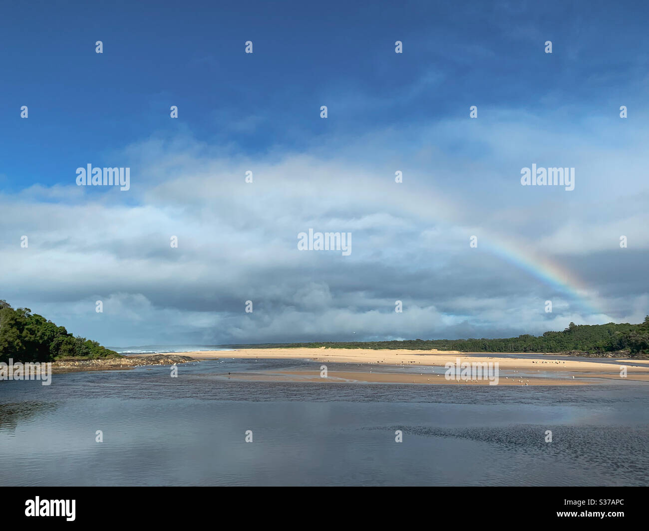 Rainbow over the beach hi-res stock photography and images - Alamy