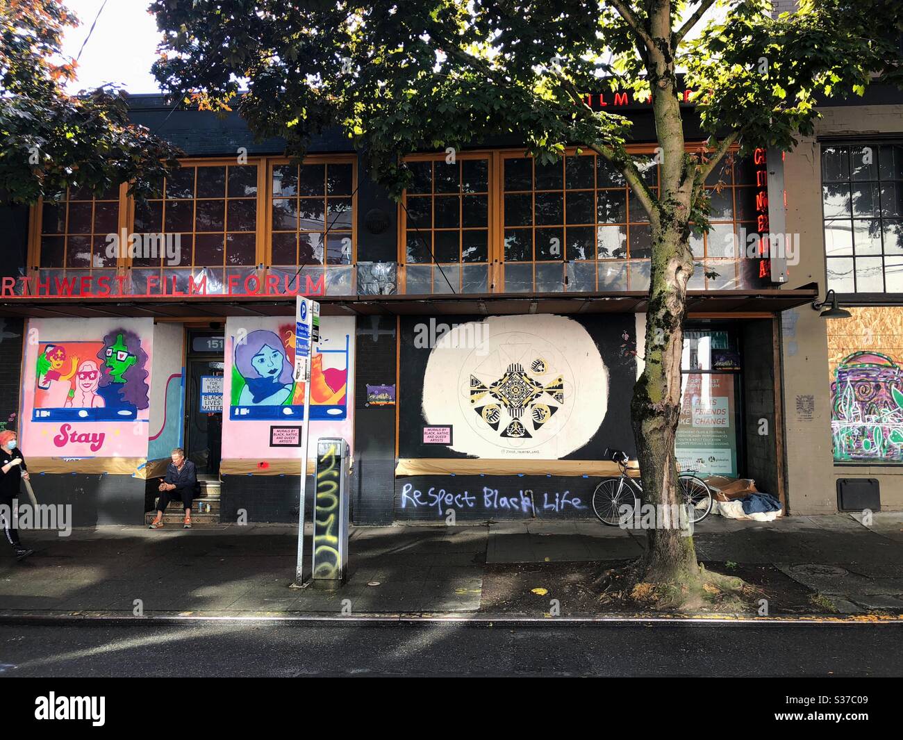 Murals painted by BIPOC and Native People covering boarded up windows ...