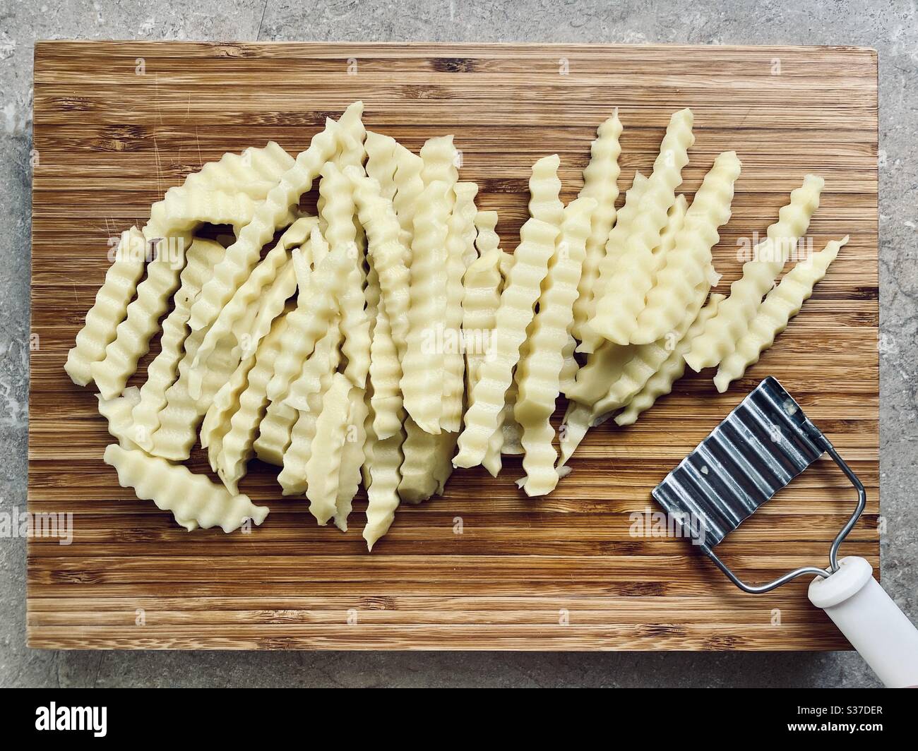 Crinkle potato fries hi-res stock photography and images - Alamy