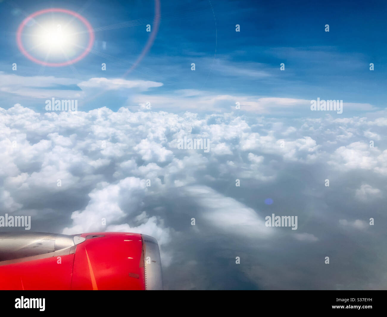 Beautiful click sky view from plane window Stock Photo - Alamy