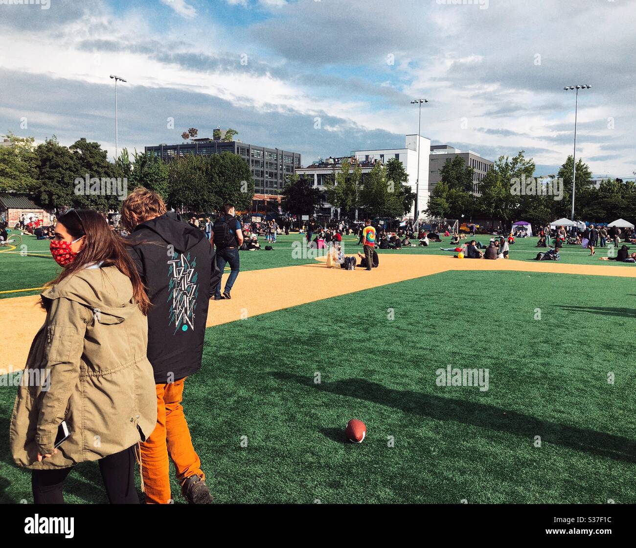 people are on the sport field in Cal Anderson park in Capitol Hill CHOP ...