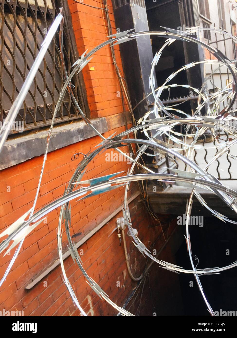 Concertina wire. Was placed in front of many buildings in midtown ...