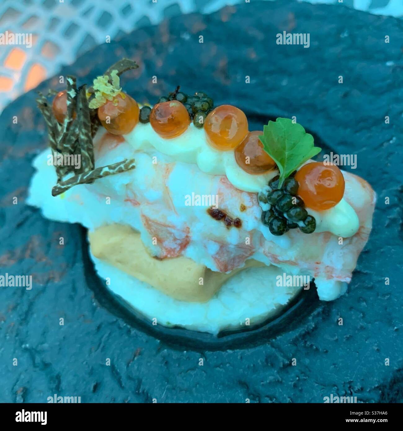 Smoked lobster and sea urchin mousse course at 5.8 undersea restaurant ...