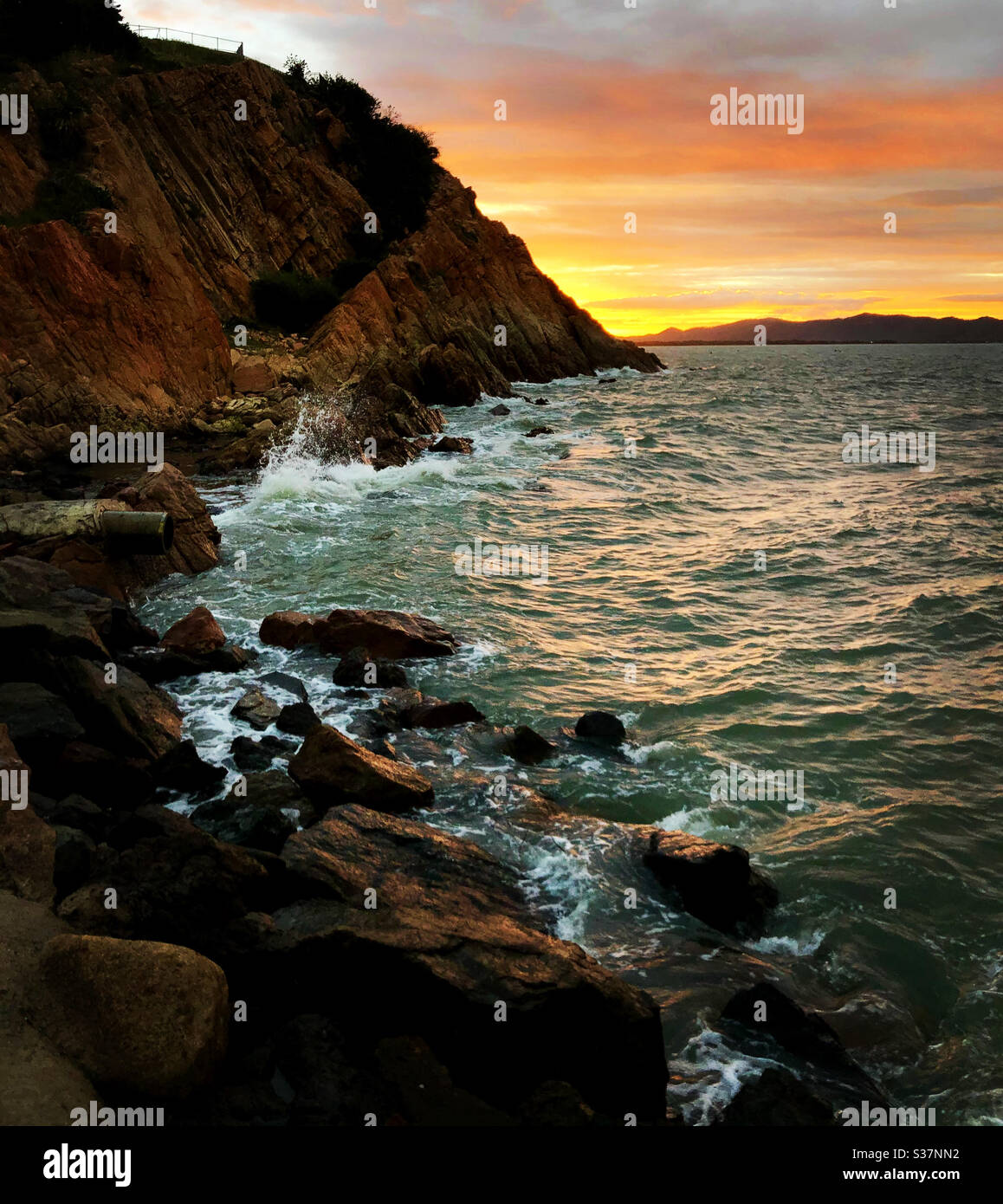 Sunset beach rocks hi-res stock photography and images - Alamy