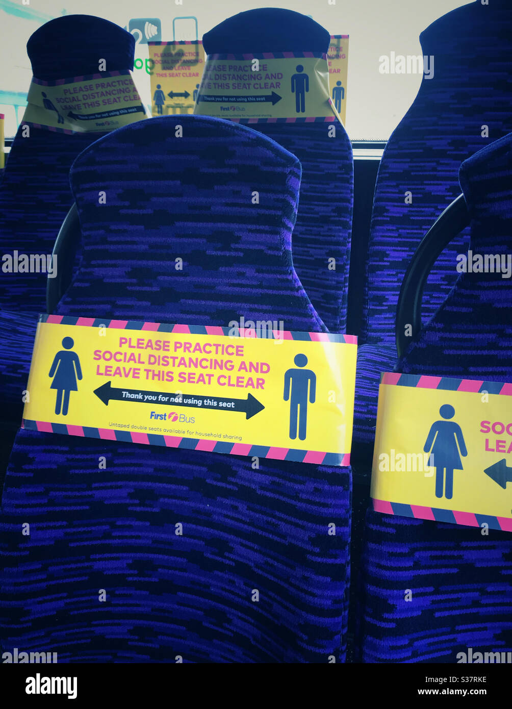 Social distancing signs on a local bus Stock Photo - Alamy