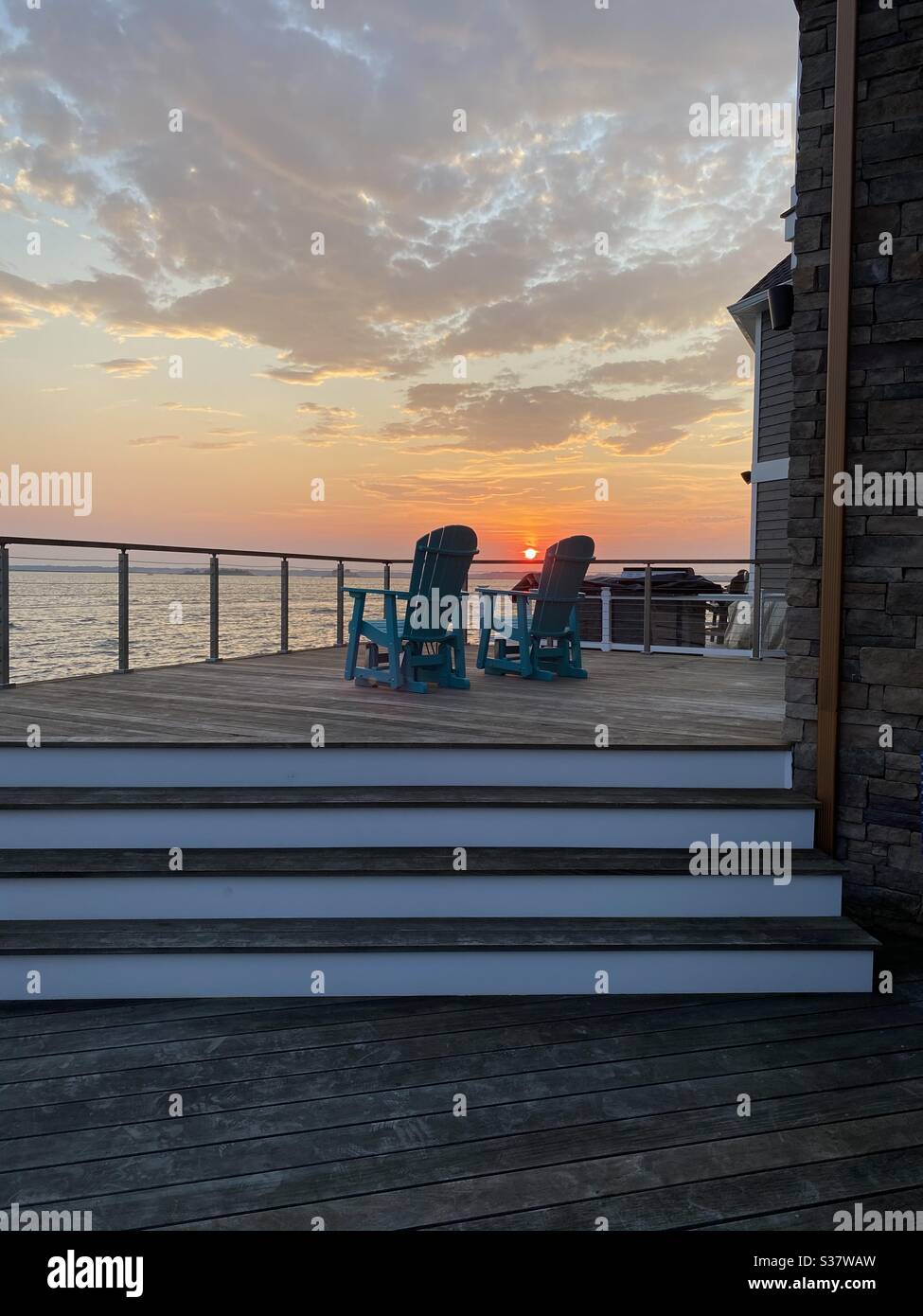 Deck chairs sunset hi-res stock photography and images - Alamy