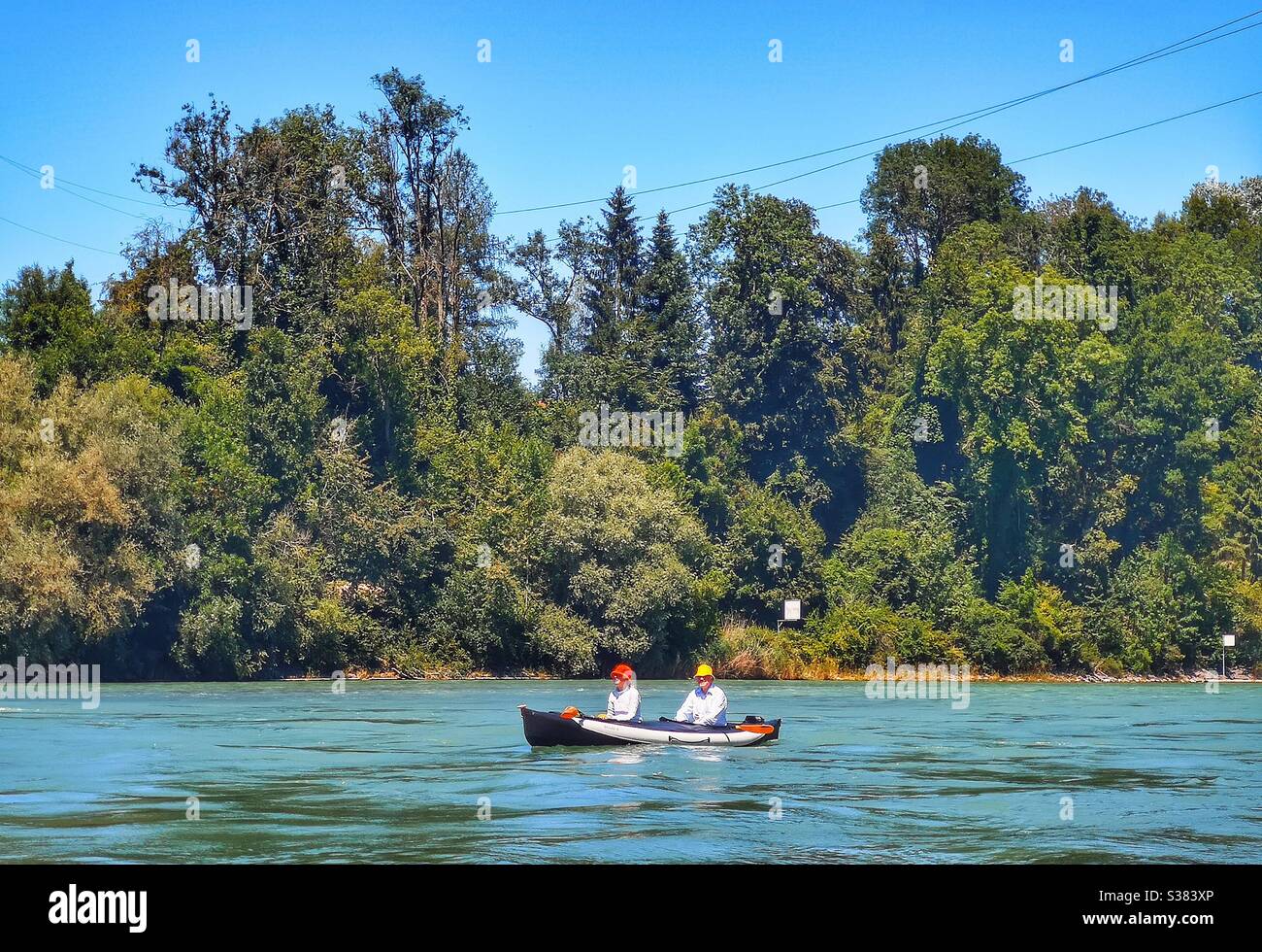 Couple sailing inflatable boat on Aare river, Switzerland Stock Photo ...