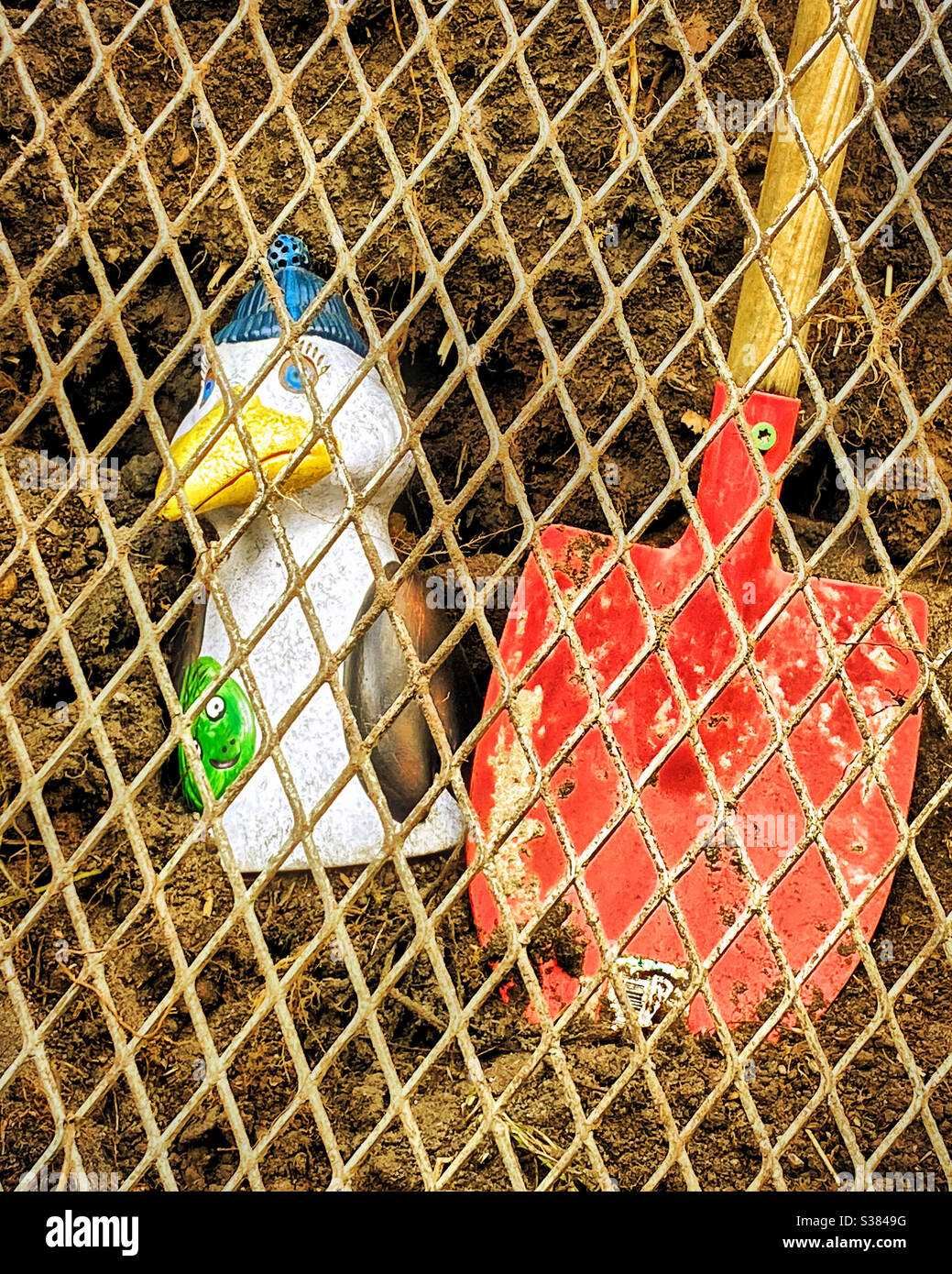 Figurine with earth work Stock Photo - Alamy