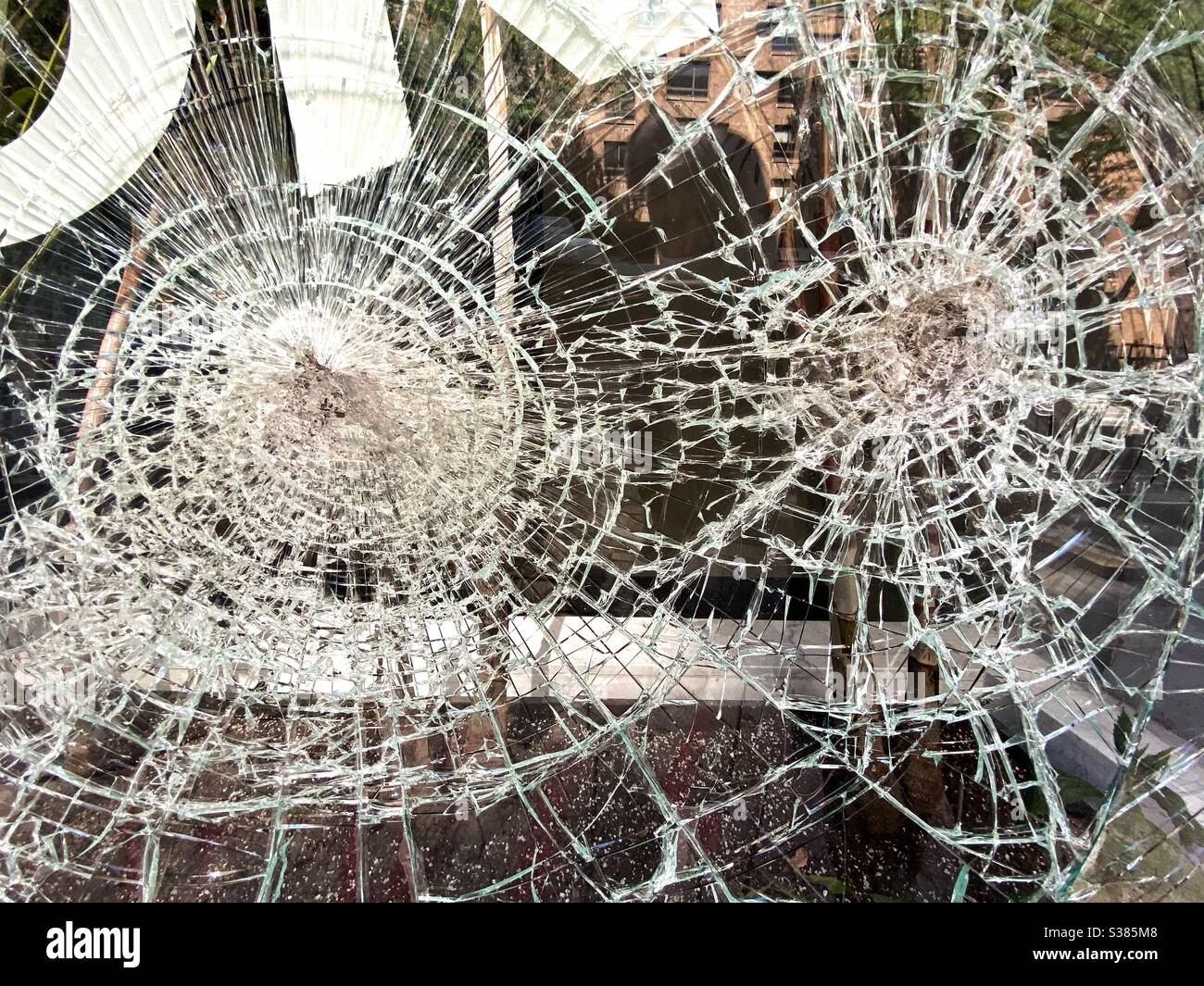 Broken storefront window in Manhattan, New York due to rioting and ...