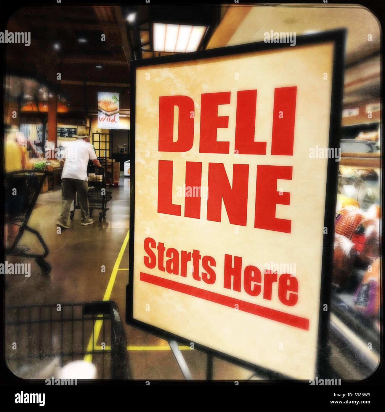 Deli line starts here Stock Photo - Alamy
