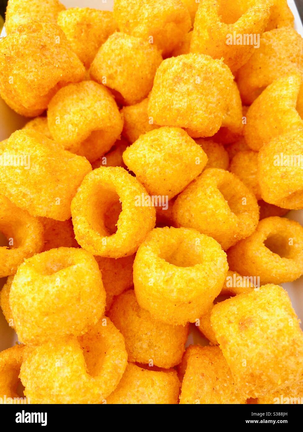 Cheesy puff crisps hi-res stock photography and images - Alamy