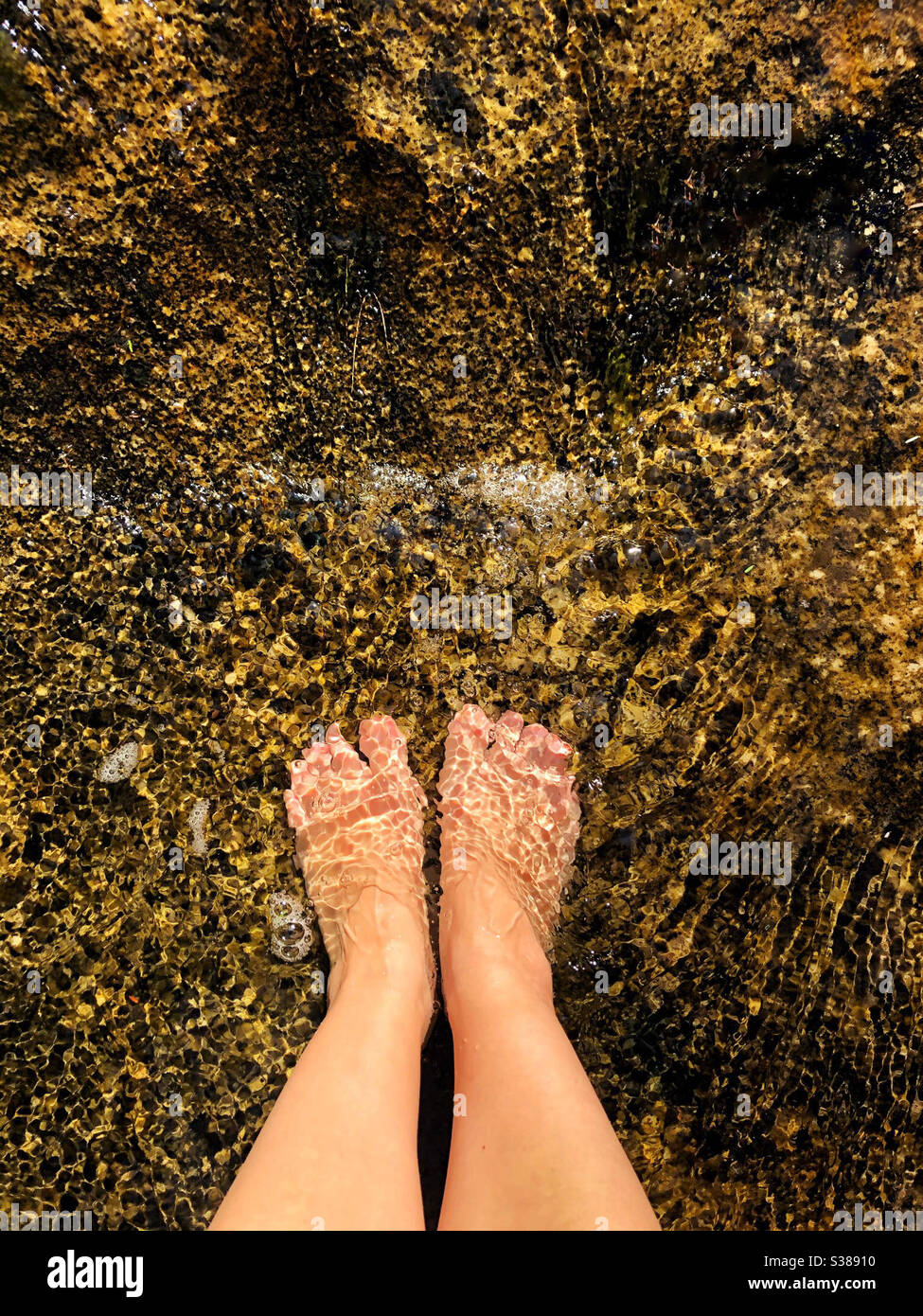 Woman wading in river hi-res stock photography and images - Alamy