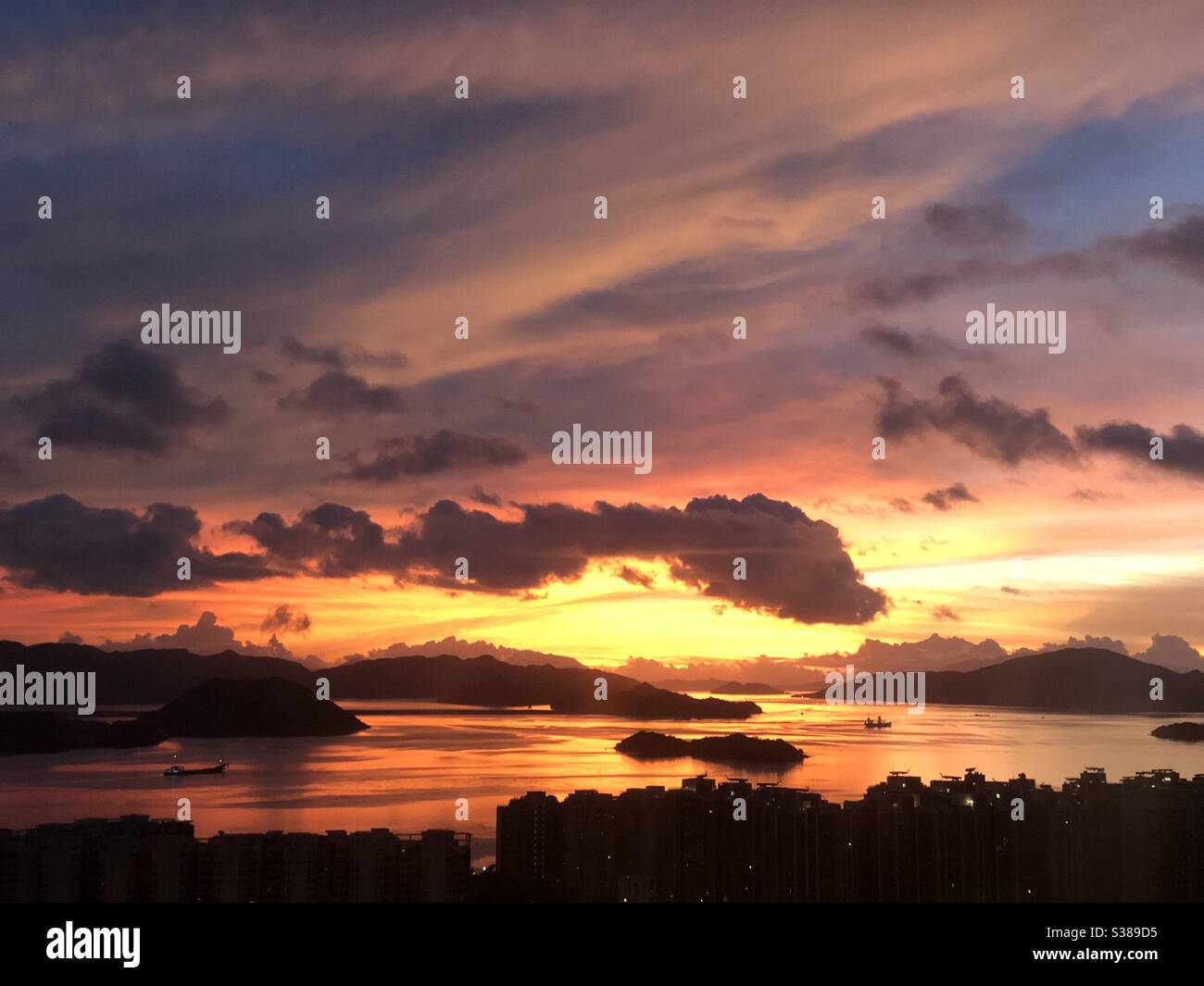 Sunrise over Tolo harbour in Hong Kong Stock Photo - Alamy
