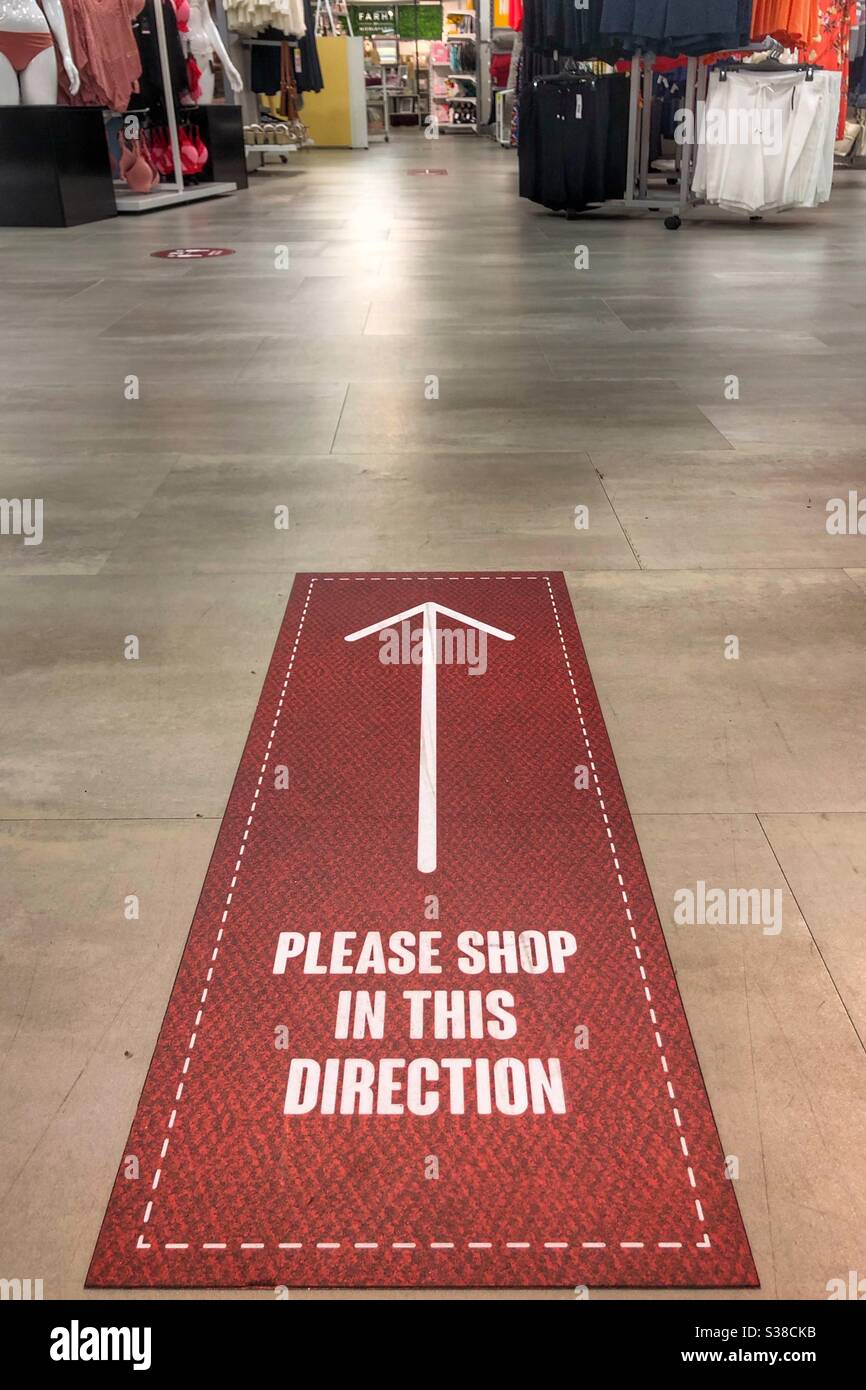 Please shop in this direction instruction during covid19 Stock Photo ...