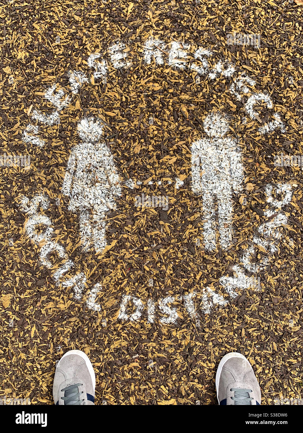 Please respect social distancing sign on the ground. Captured at Heaton ...