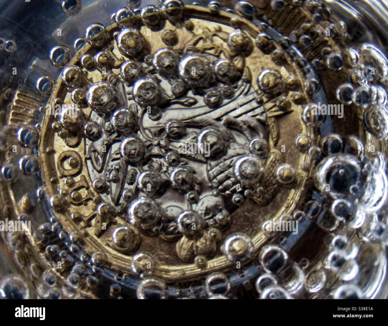 Macro Photography - Pound Coin with Bubbles Stock Photo - Alamy