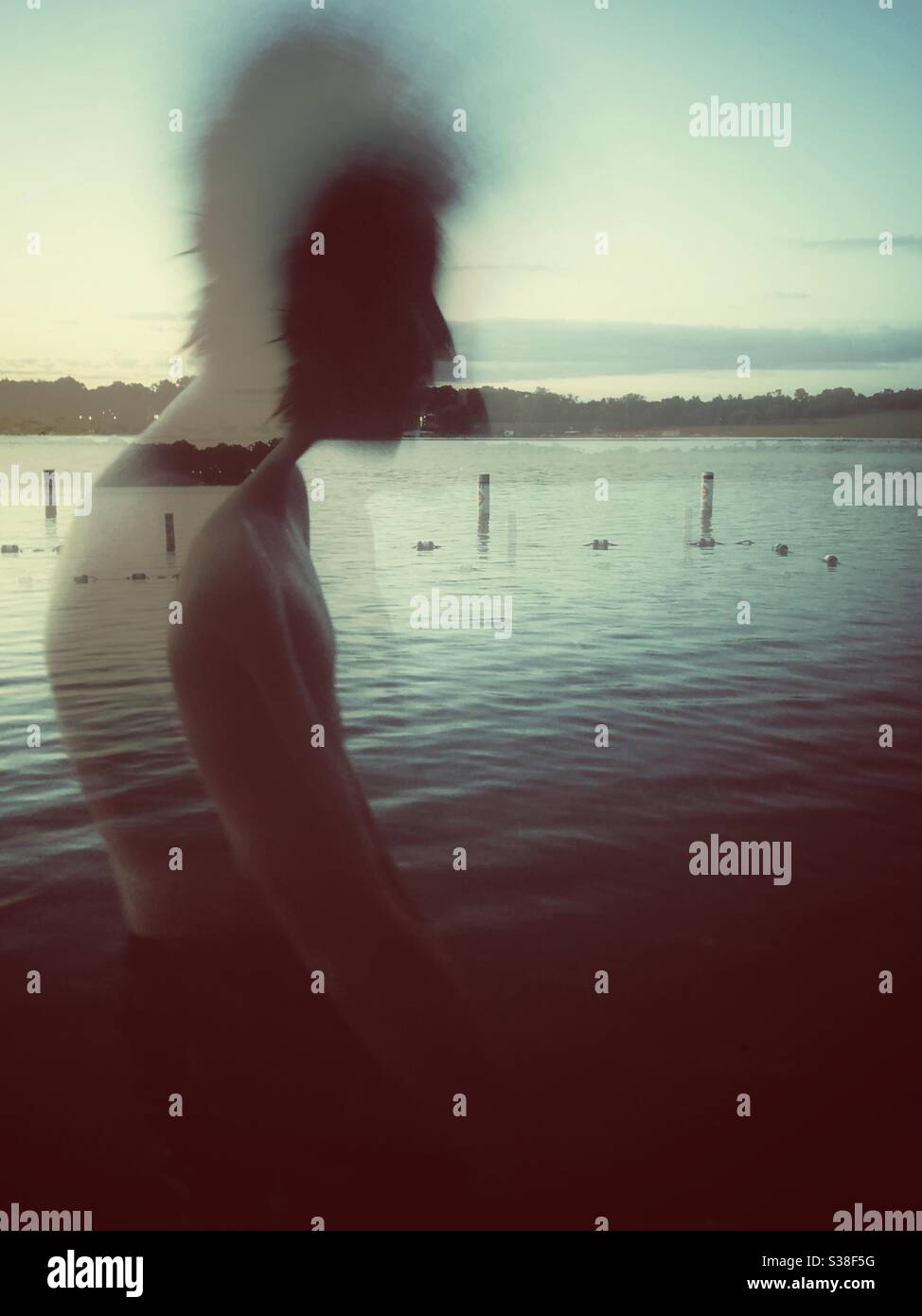 Double exposure of teen boy at lake moody photo Stock Photo - Alamy