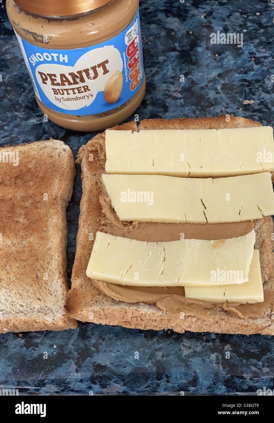 July 2020 - Mature Cheddar cheese with Peanut butter on Toast Stock ...