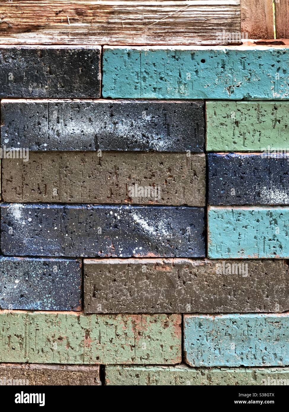 Contrasting brick wall Stock Photo - Alamy