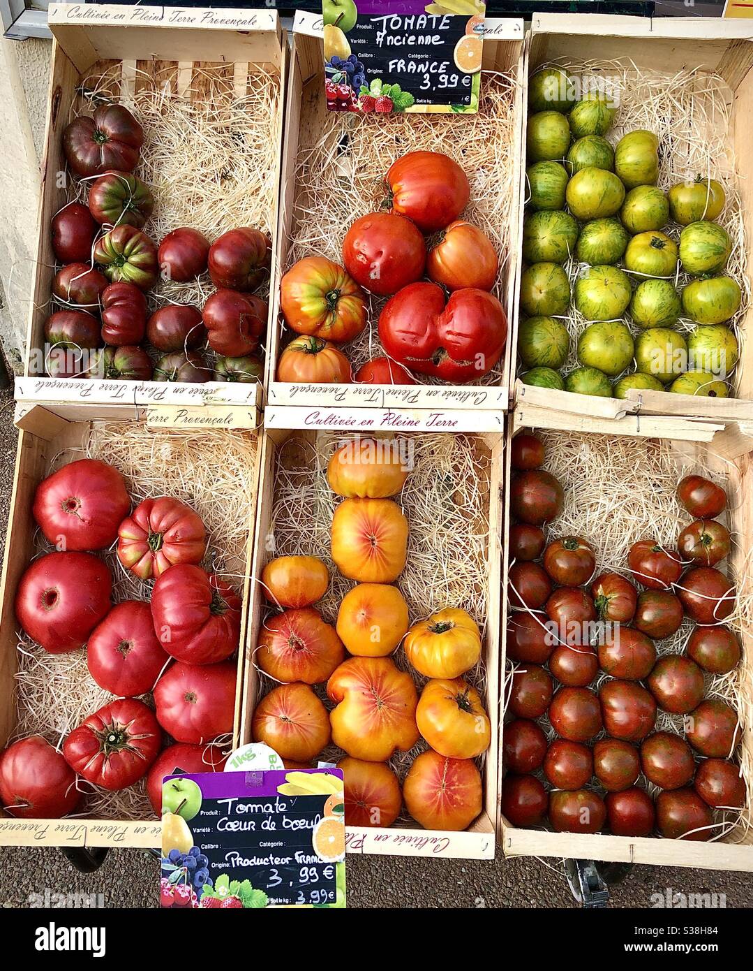 Heritage tomatoes on display outside French village food shop Stock ...