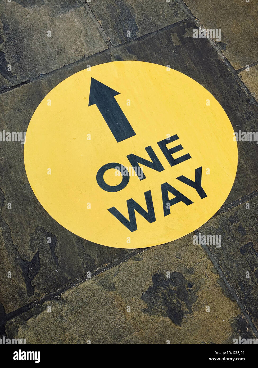 ONE WAY sign. Arrow pointing up and forward. An instruction about a ...