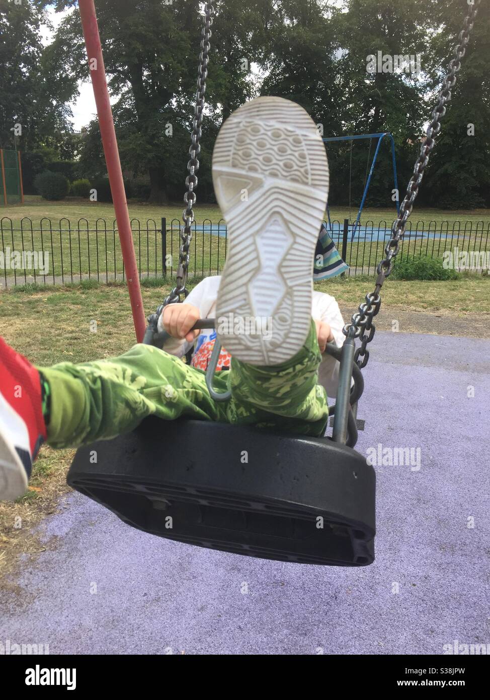 Foot swing hi-res stock photography and images - Alamy